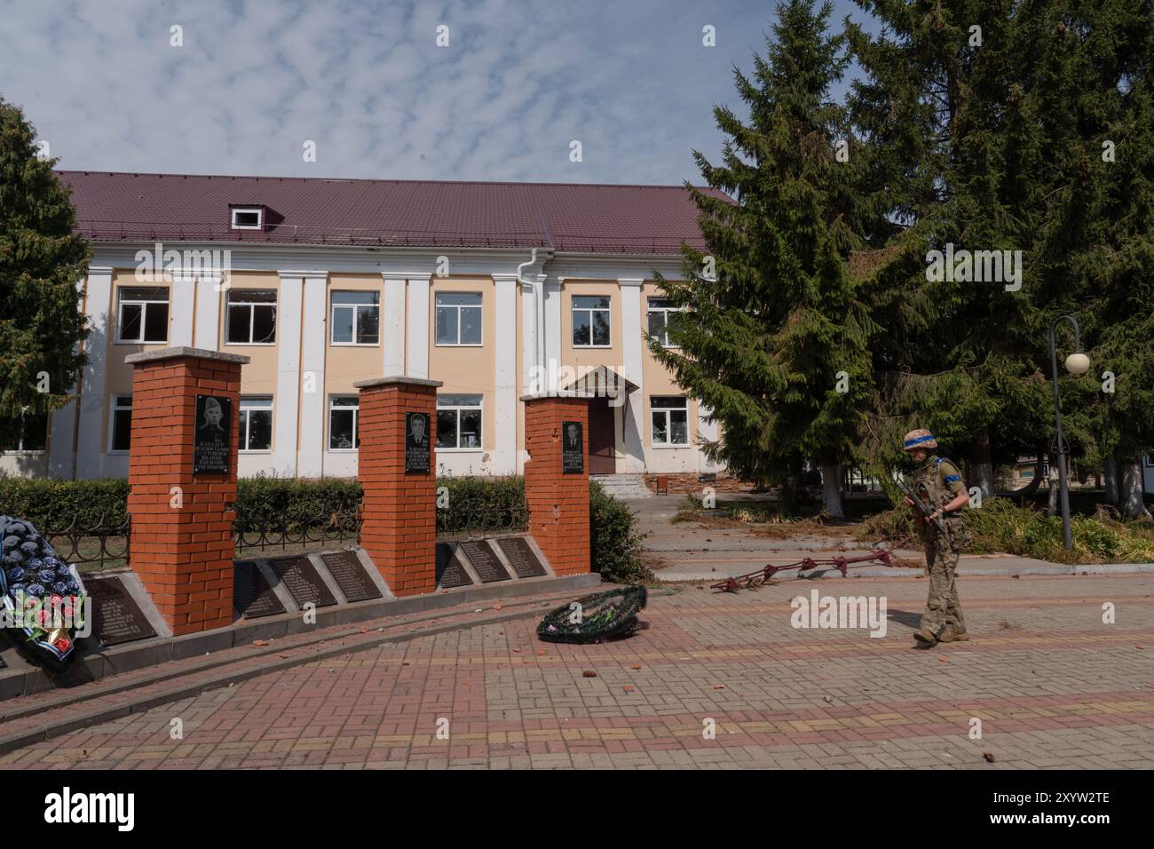 A Ukrainian soldier is seen patrolling in a World War II memorial in ...