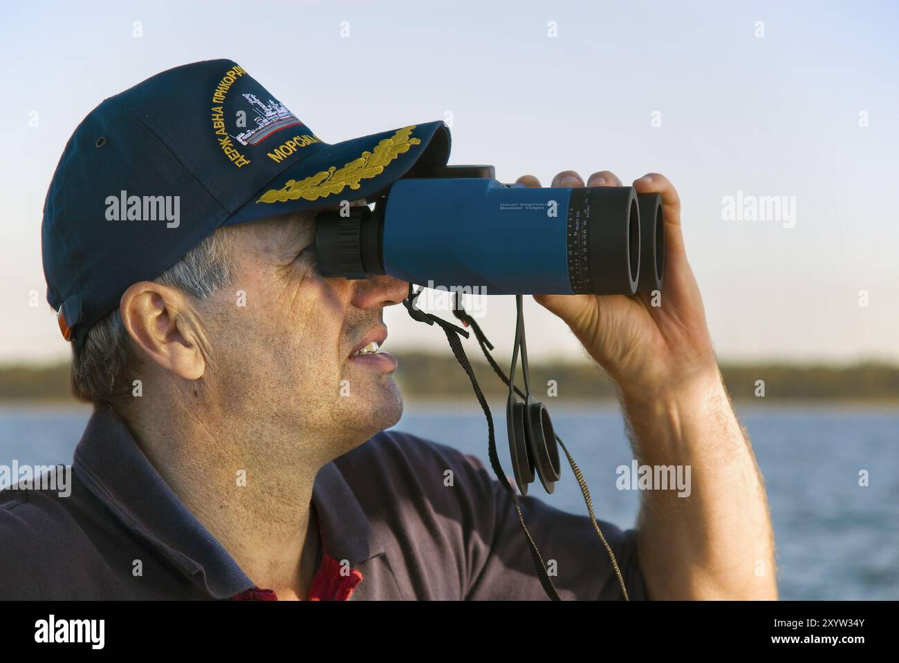 Guard officer with binoculars Stock Photo - Alamy