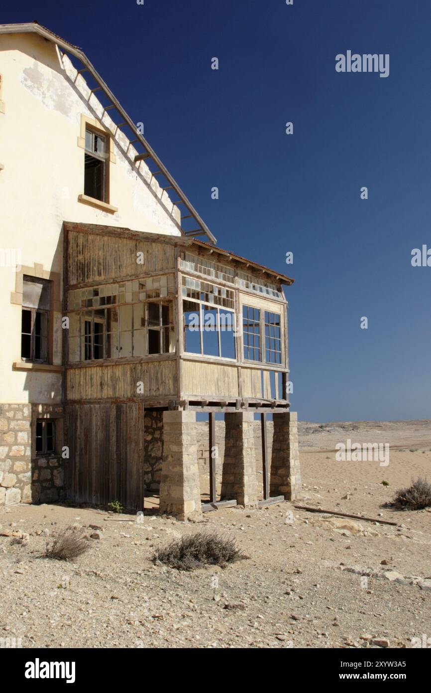 Ruins in the abandoned diamond mining town of Kolmanskop in Namibia ...
