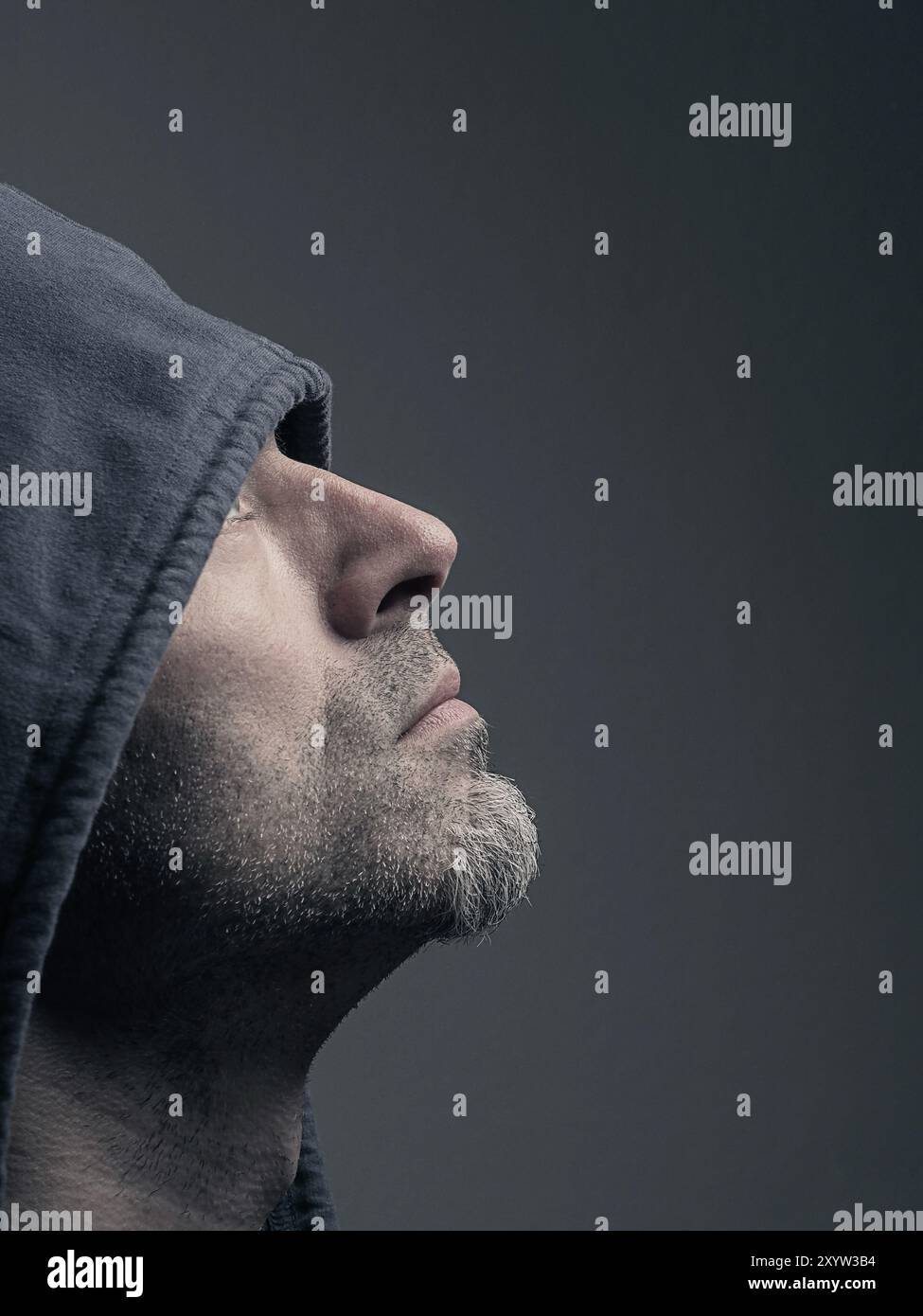 Profile of a handsome man with a Hoodie Stock Photo - Alamy