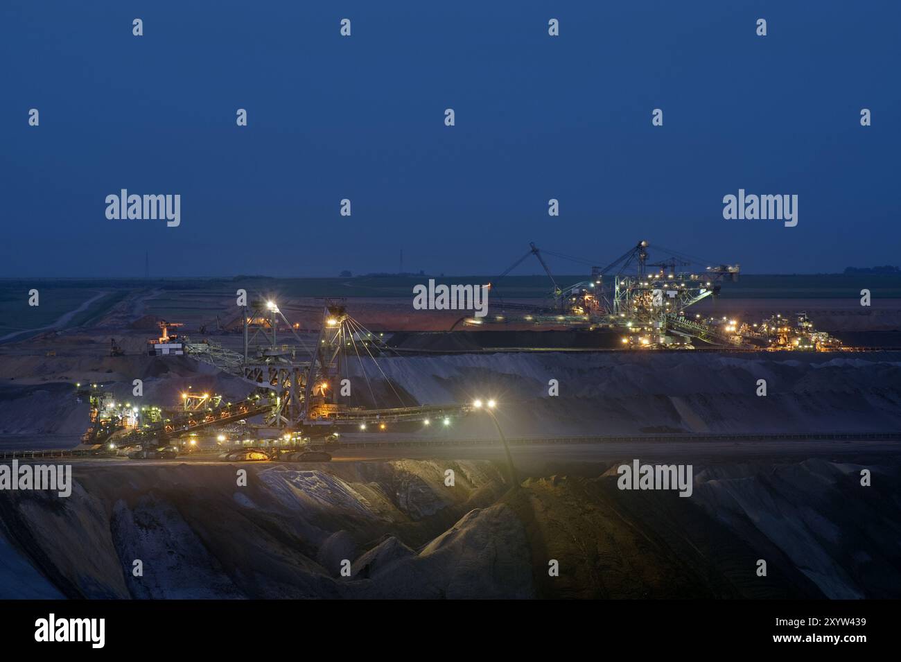Night shift in open-cast mining Stock Photo - Alamy