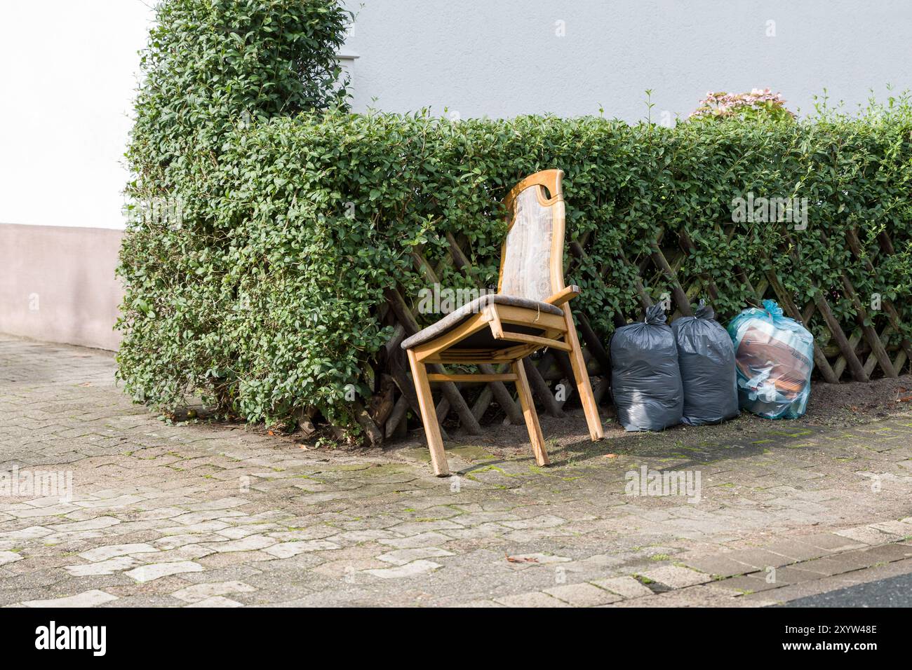 Bulky waste at the roadside Stock Photo - Alamy