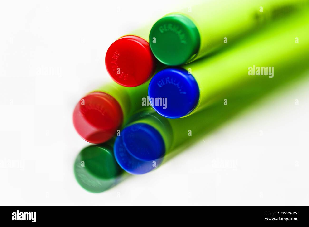 Fibre-tip pens in RGB colours on a reflective surface Stock Photo - Alamy