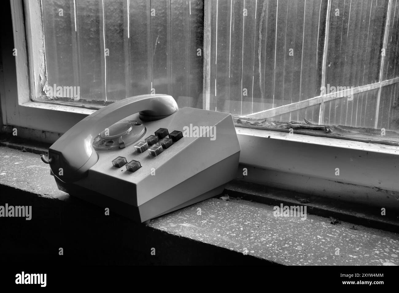 Old telephone in a disused factory Stock Photo - Alamy