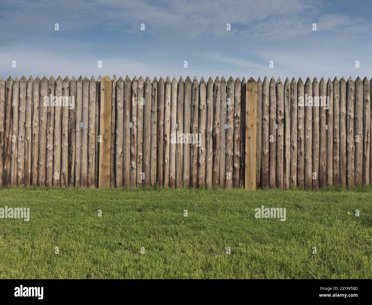 Palisade wall of a fort Stock Photo - Alamy