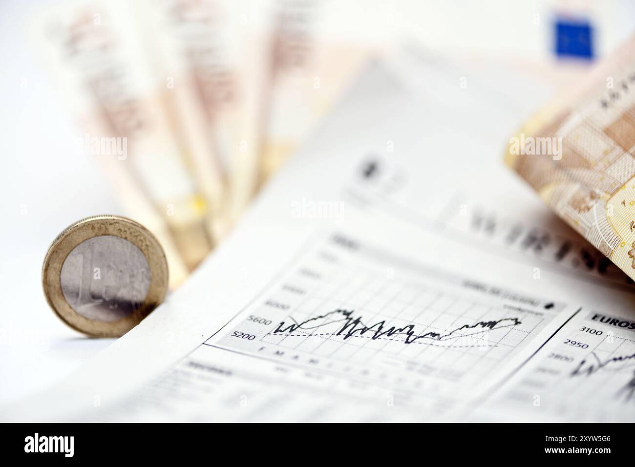 Stock market price in a newspaper and cash Stock Photo - Alamy