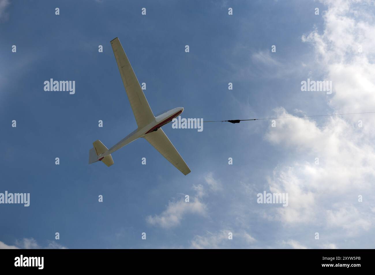 Glider seen from below during the take-off phase Stock Photo - Alamy
