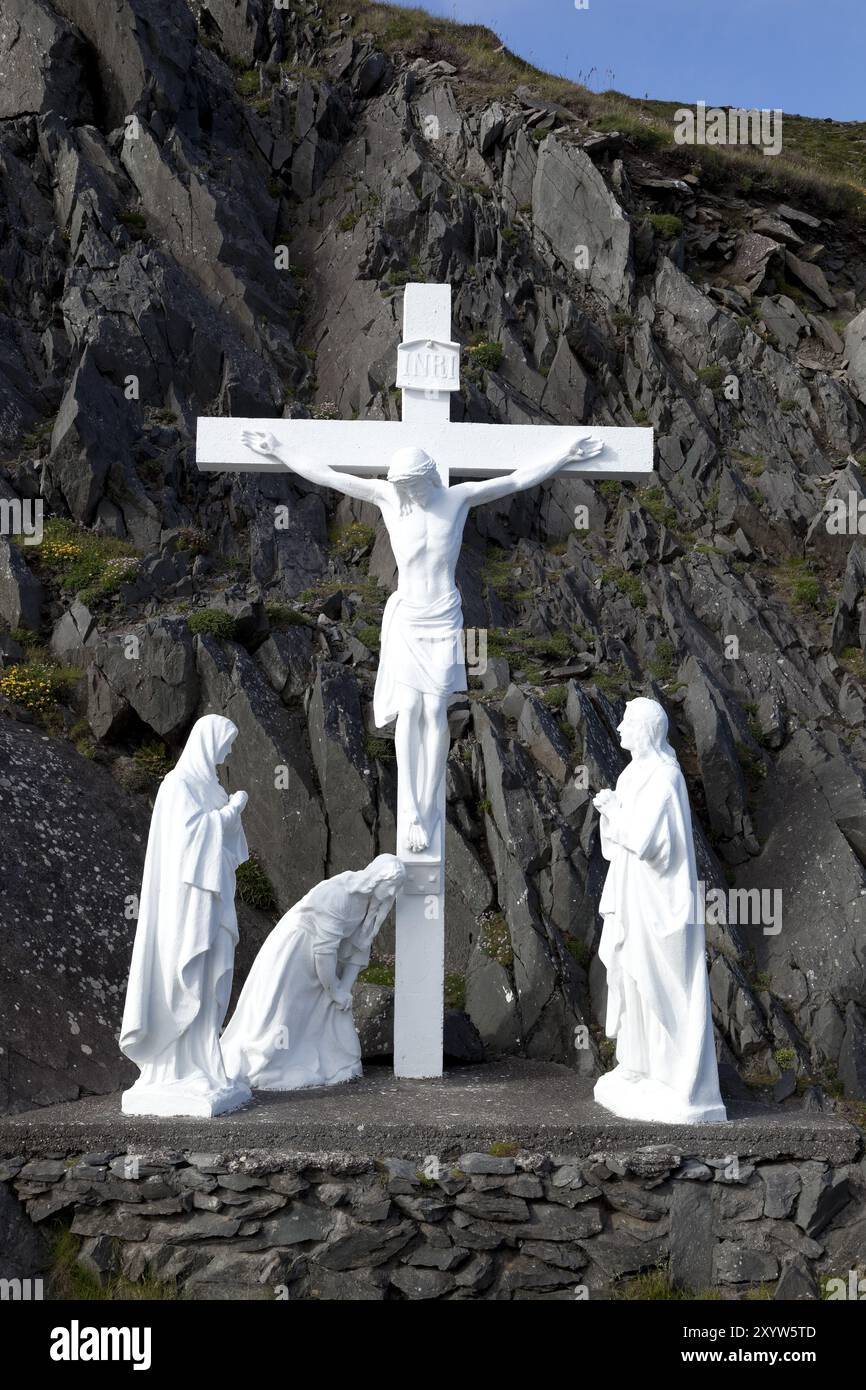 White cross beside the road, Slea Head Drive on the Dingle Peninsula ...