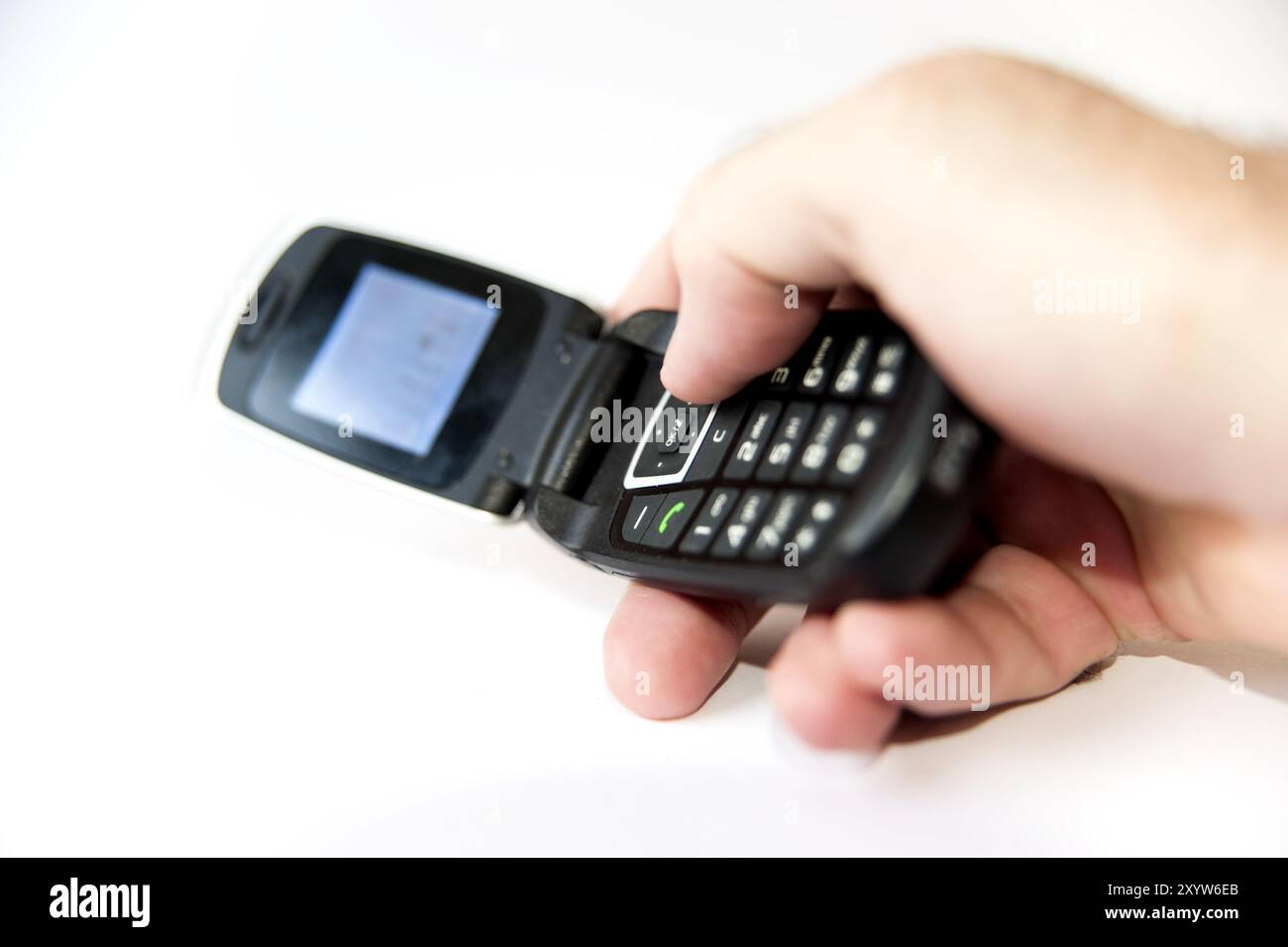 Hand holds mobile phone Stock Photo - Alamy