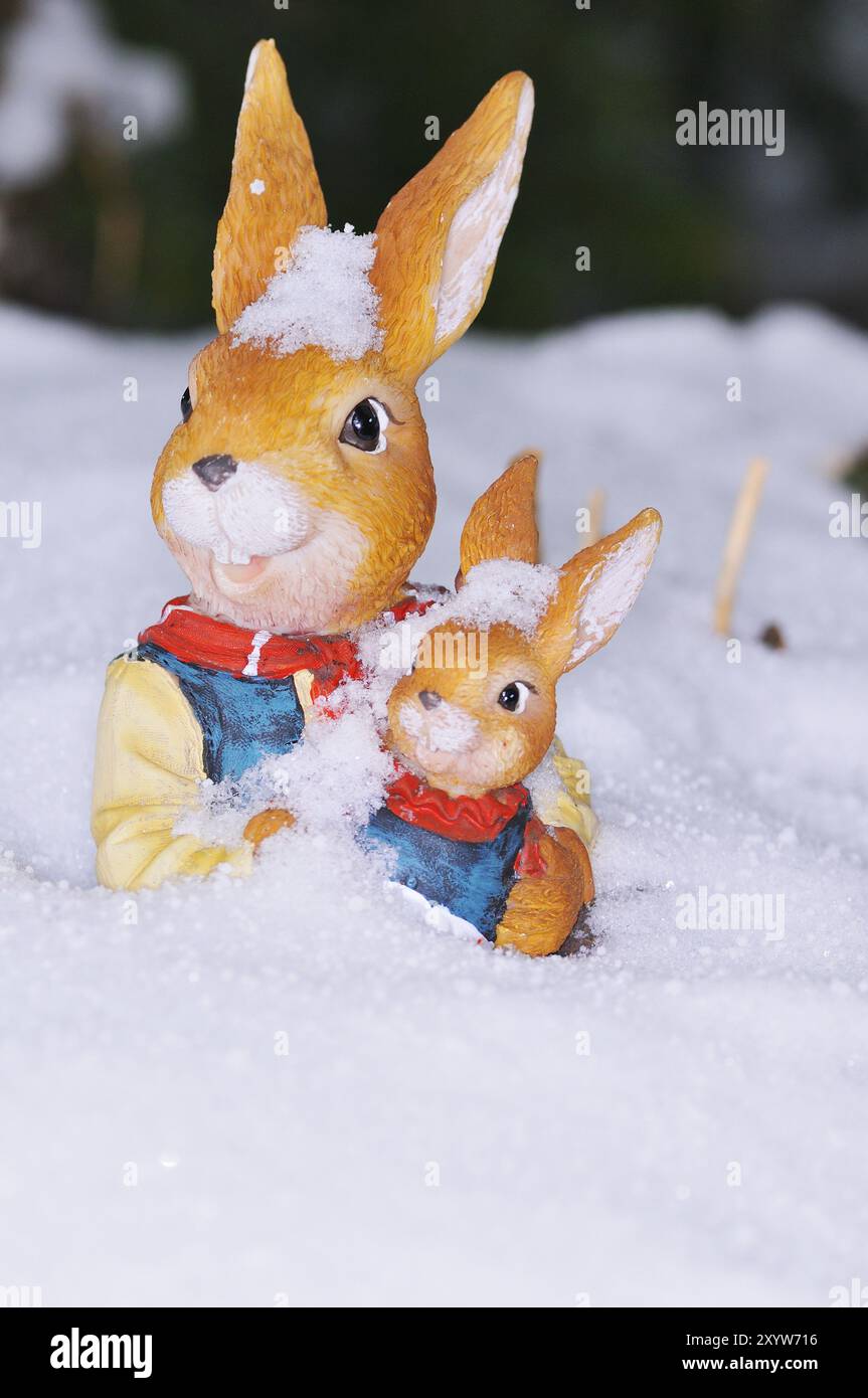 Easter in the snow, Easter bunnies in the snow Stock Photo - Alamy