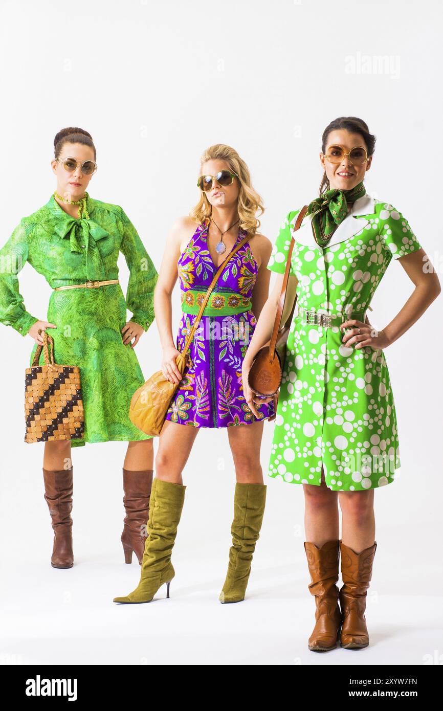 Three woman in clothes from the seventies Stock Photo - Alamy