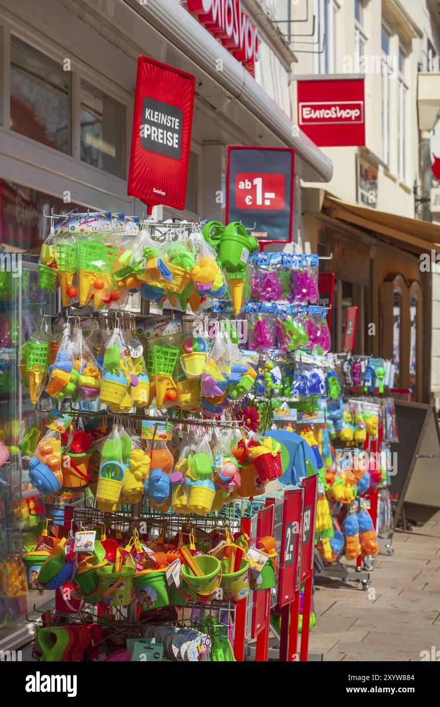 Colourful plastic toy in front of a 1-euro shop, Germany, Europe Stock ...