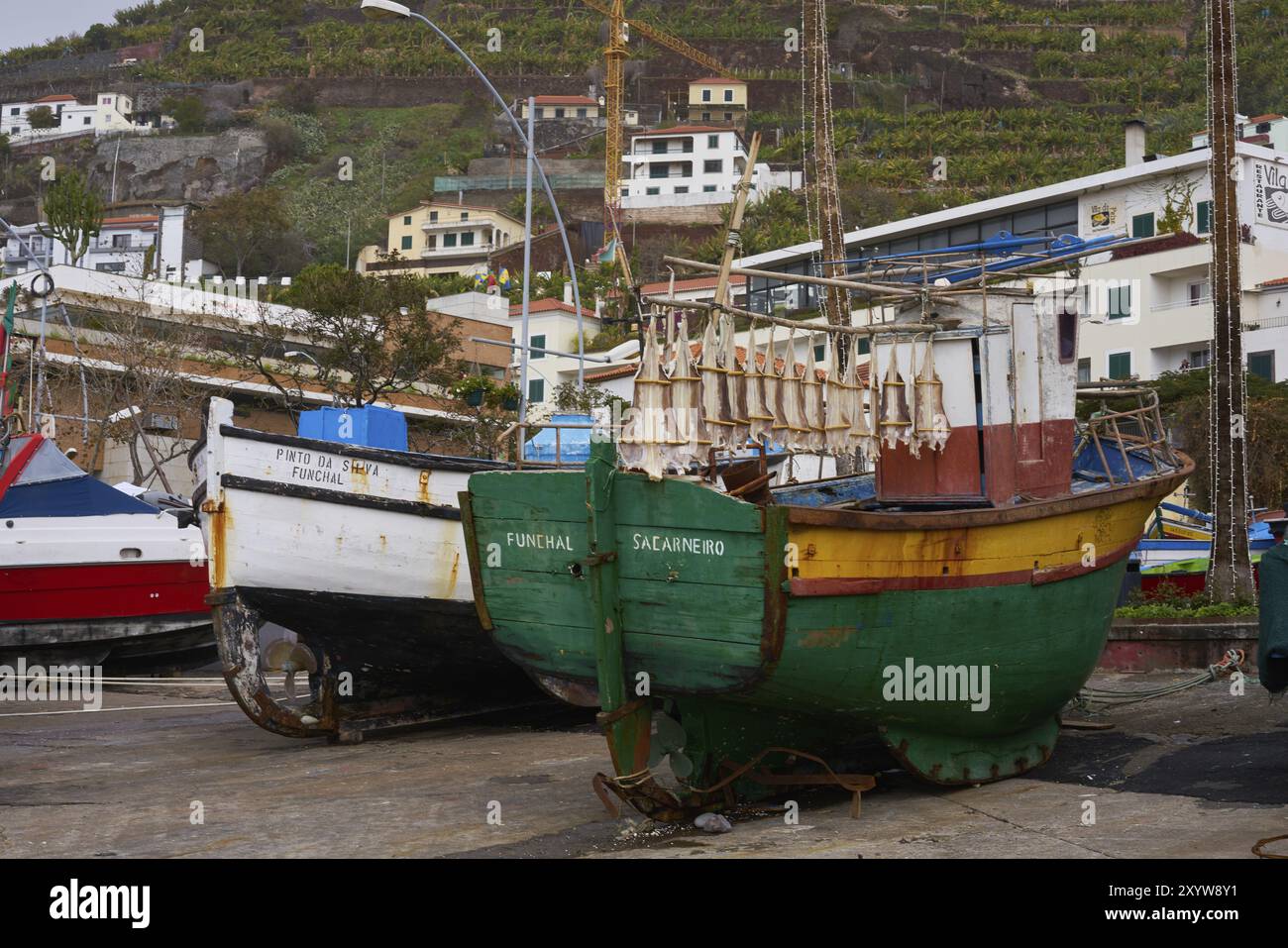 Fishing boat Sa Carneiro with codfish drying Stock Photo - Alamy