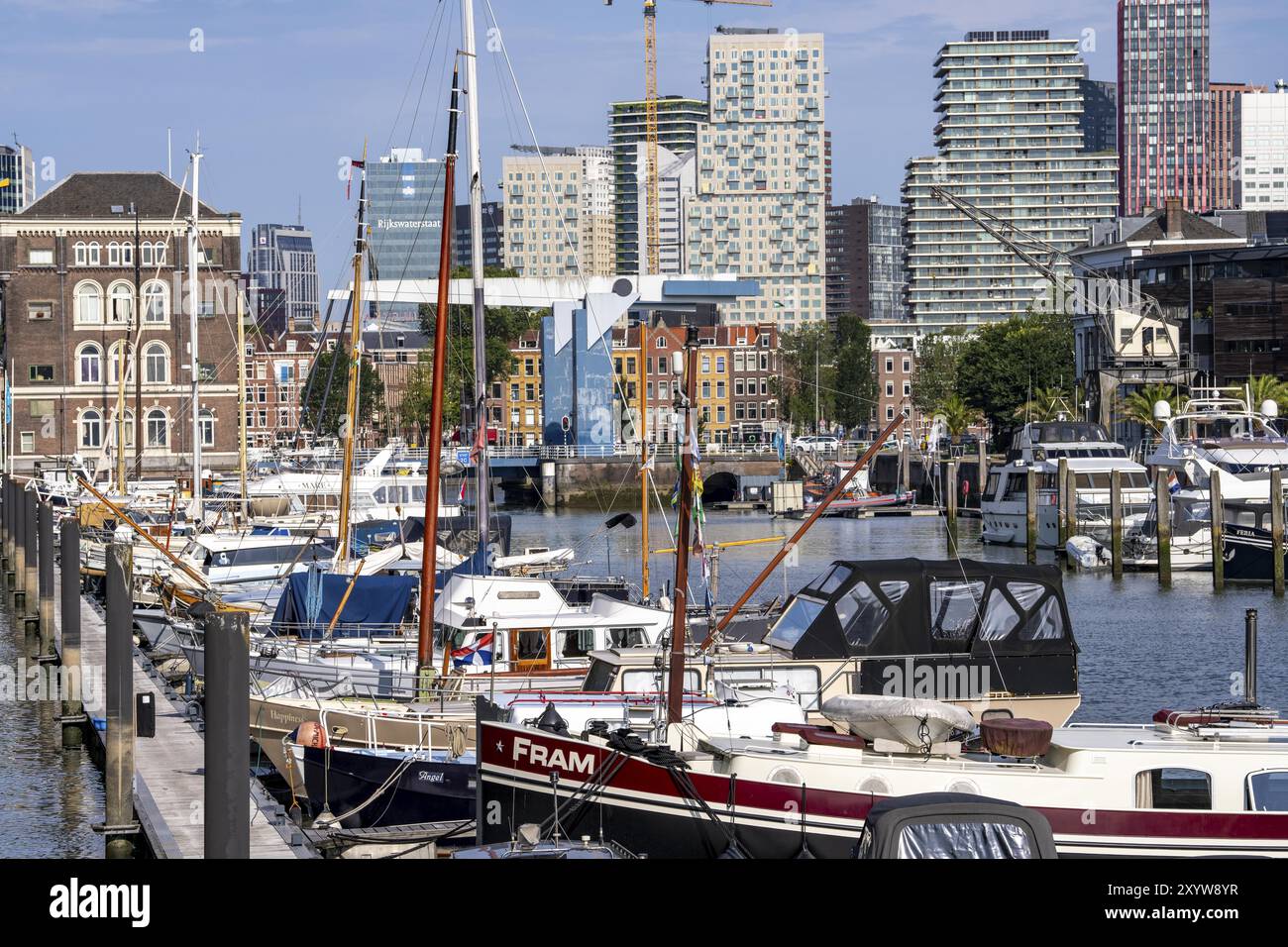 Rotterdam Marina, behind high-rise buildings in the Maritiem District ...