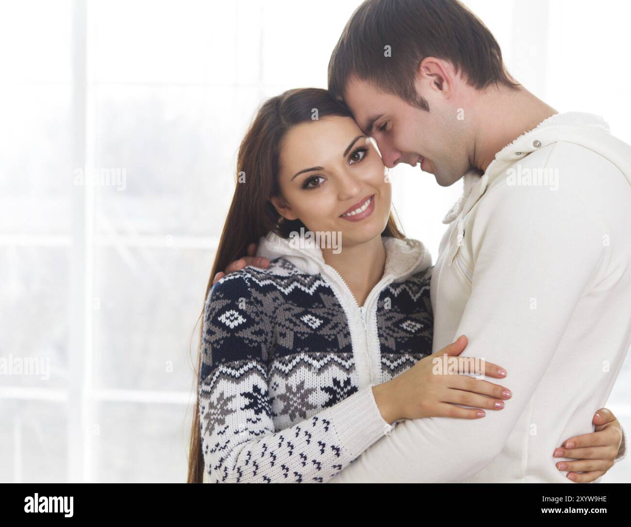 Couple wearing winter clothing hi-res stock photography and images - Alamy