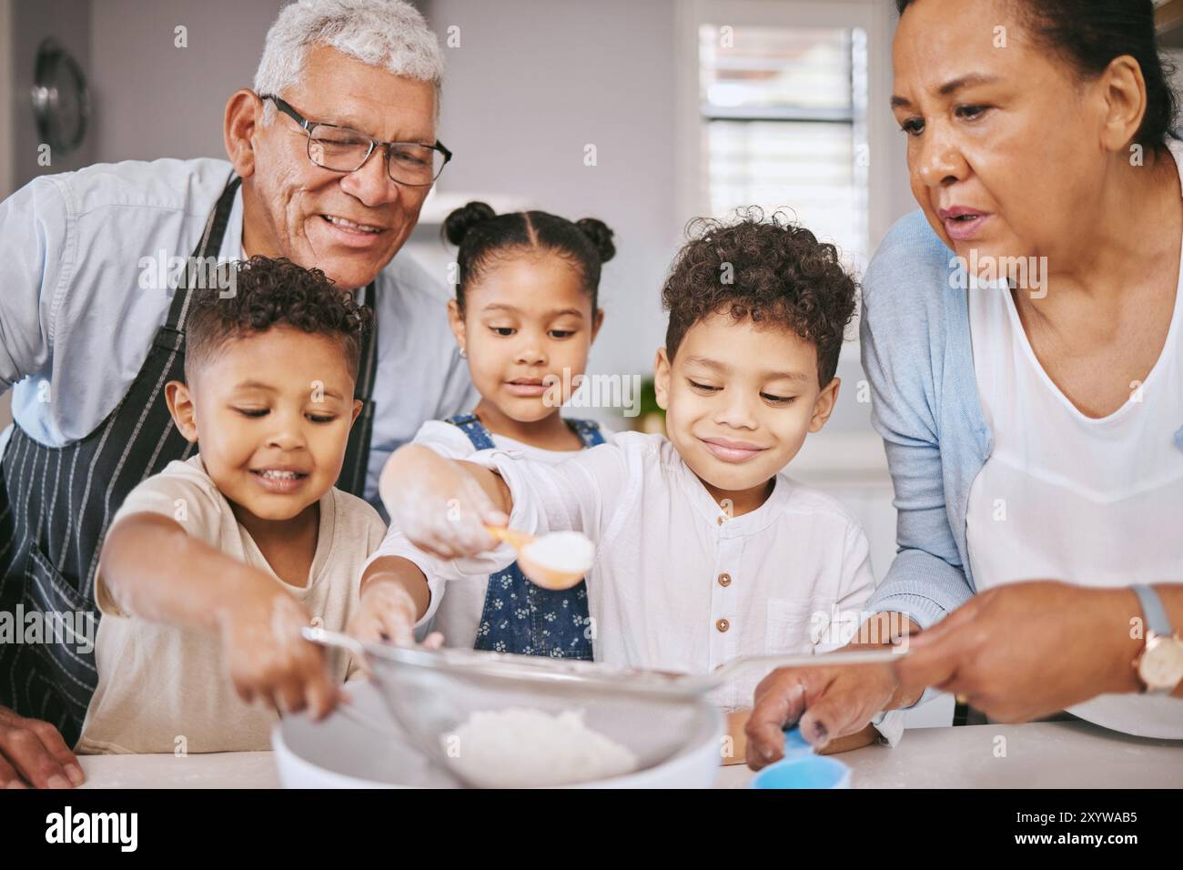 Grandchildren teaching grandma learning hi-res stock photography and ...