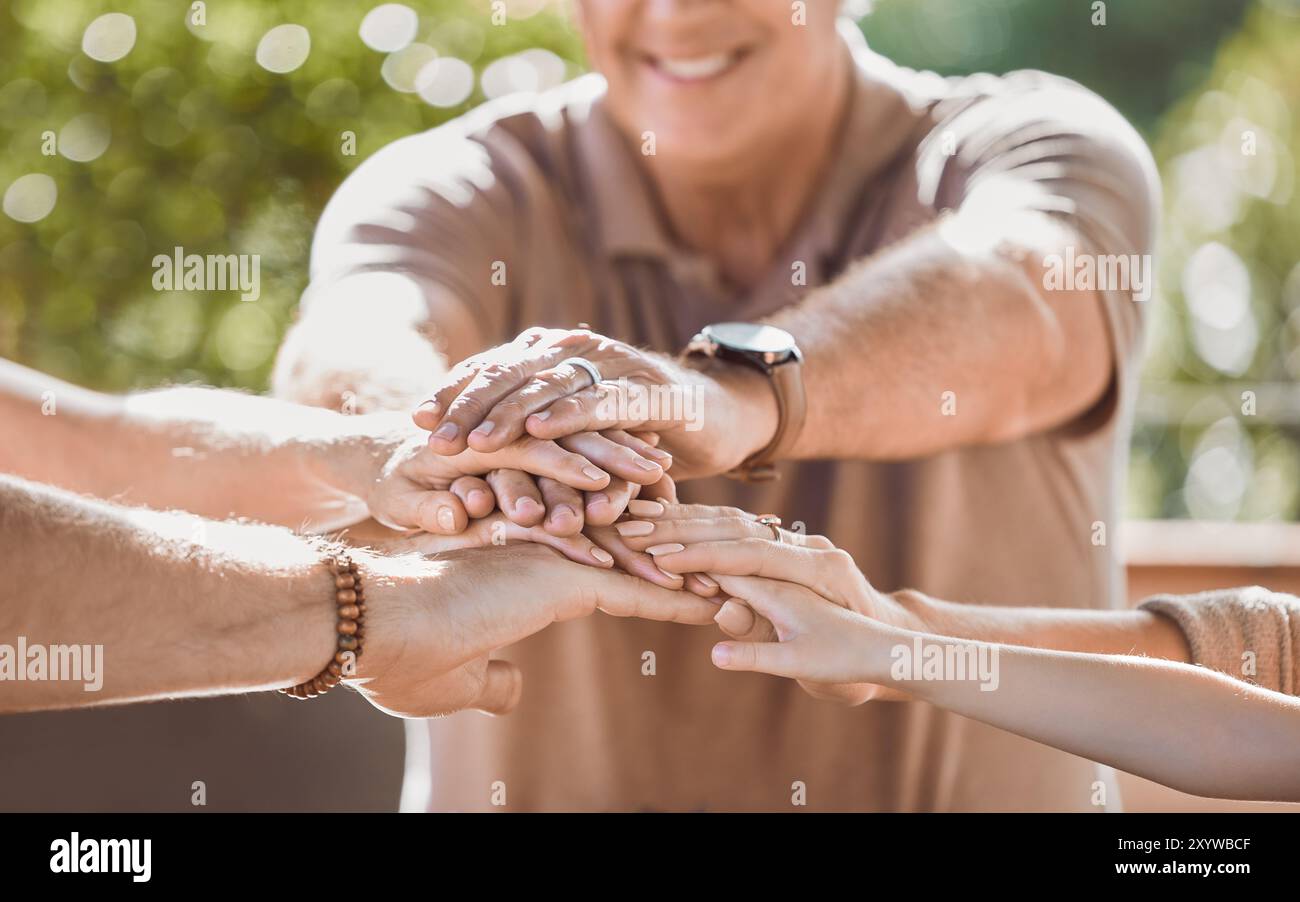 Family, hands and stack outdoor for support, solidarity and bonding ...