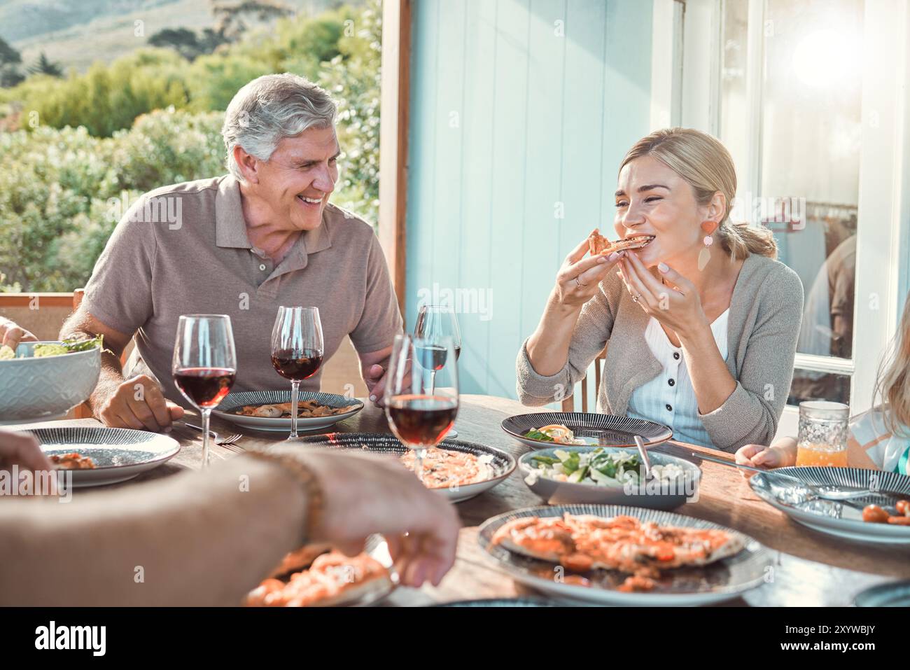 Old man dinner laughing women hi-res stock photography and images - Alamy