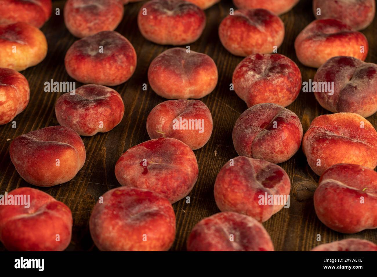 washed peaches on the table, flat ripe and soft peaches after washing ...