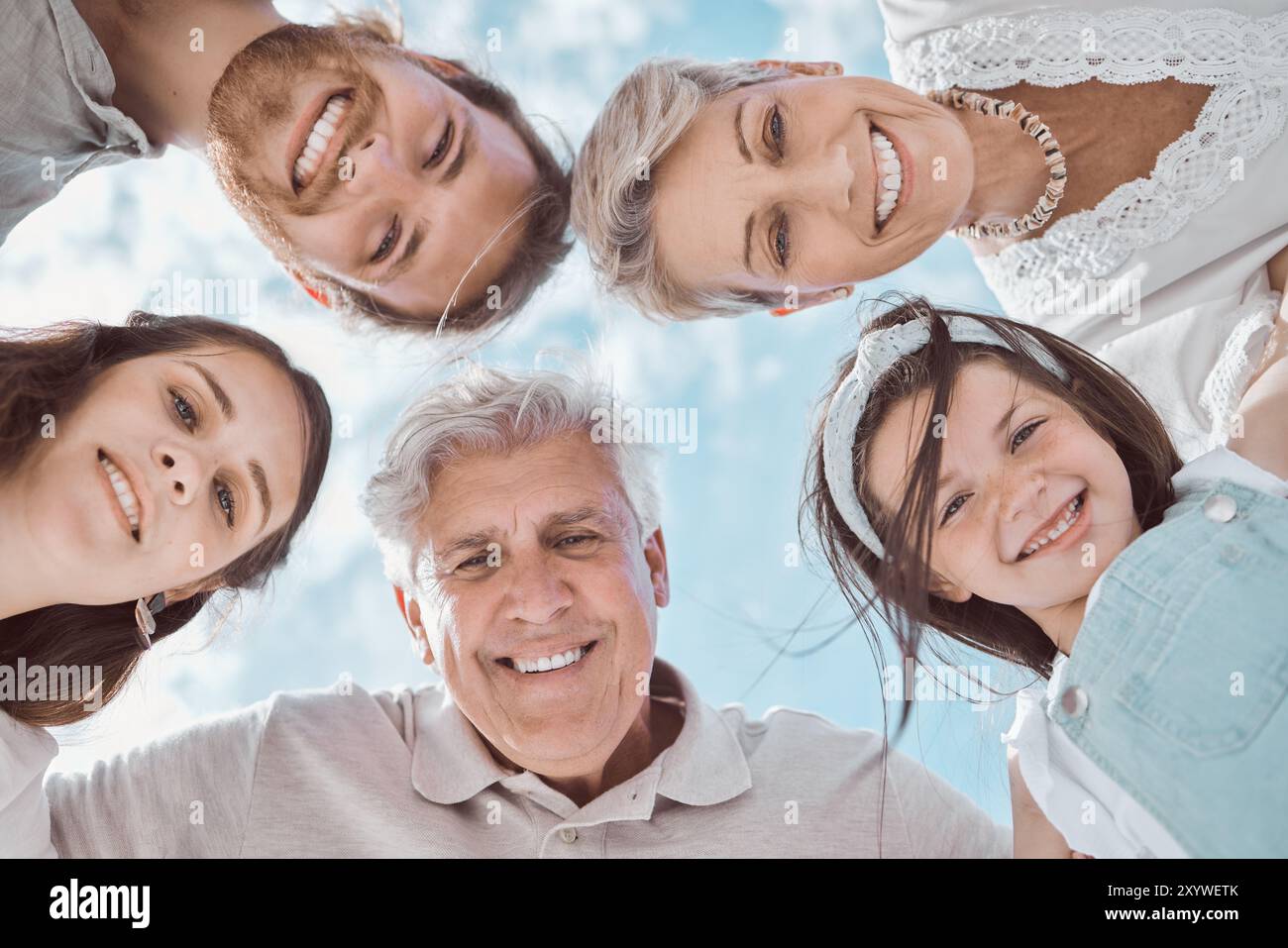 Family, portrait and circle outdoor for support, solidarity and bonding ...