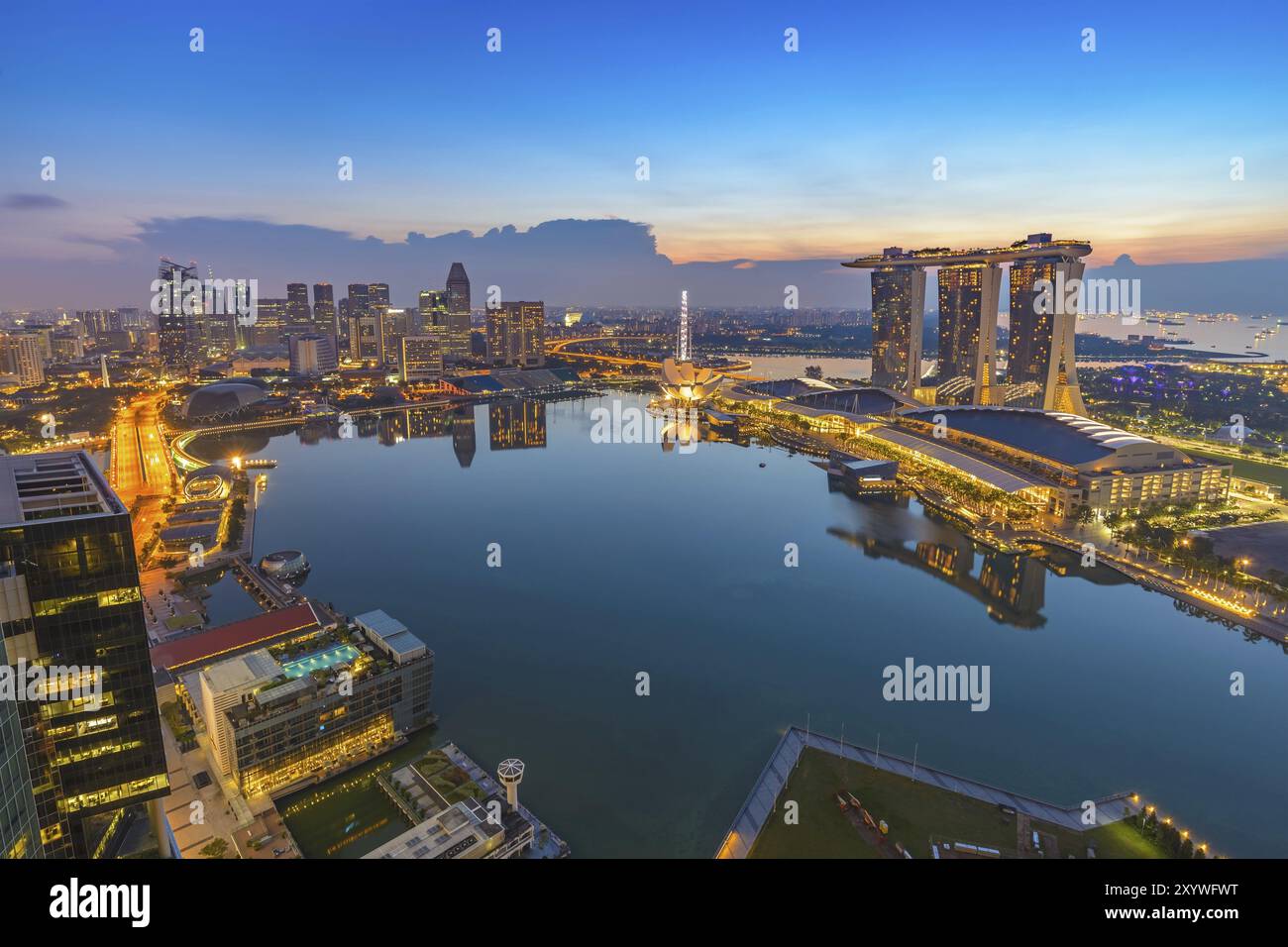 Singapore city skyline at Marina Bay when sunrise Stock Photo - Alamy