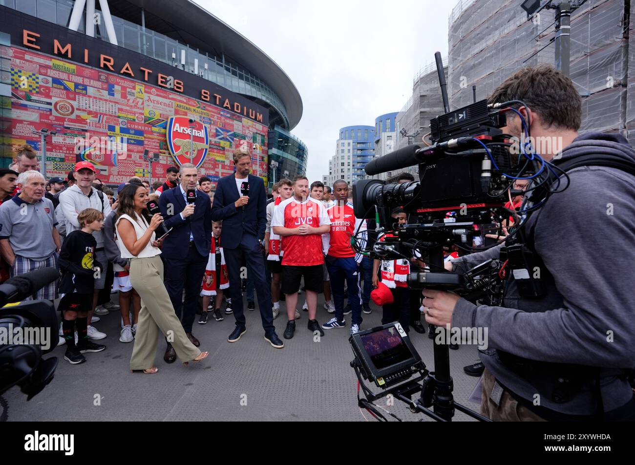 (left to right) TNT Sports presenters Jules Breach, Martin Keown and ...