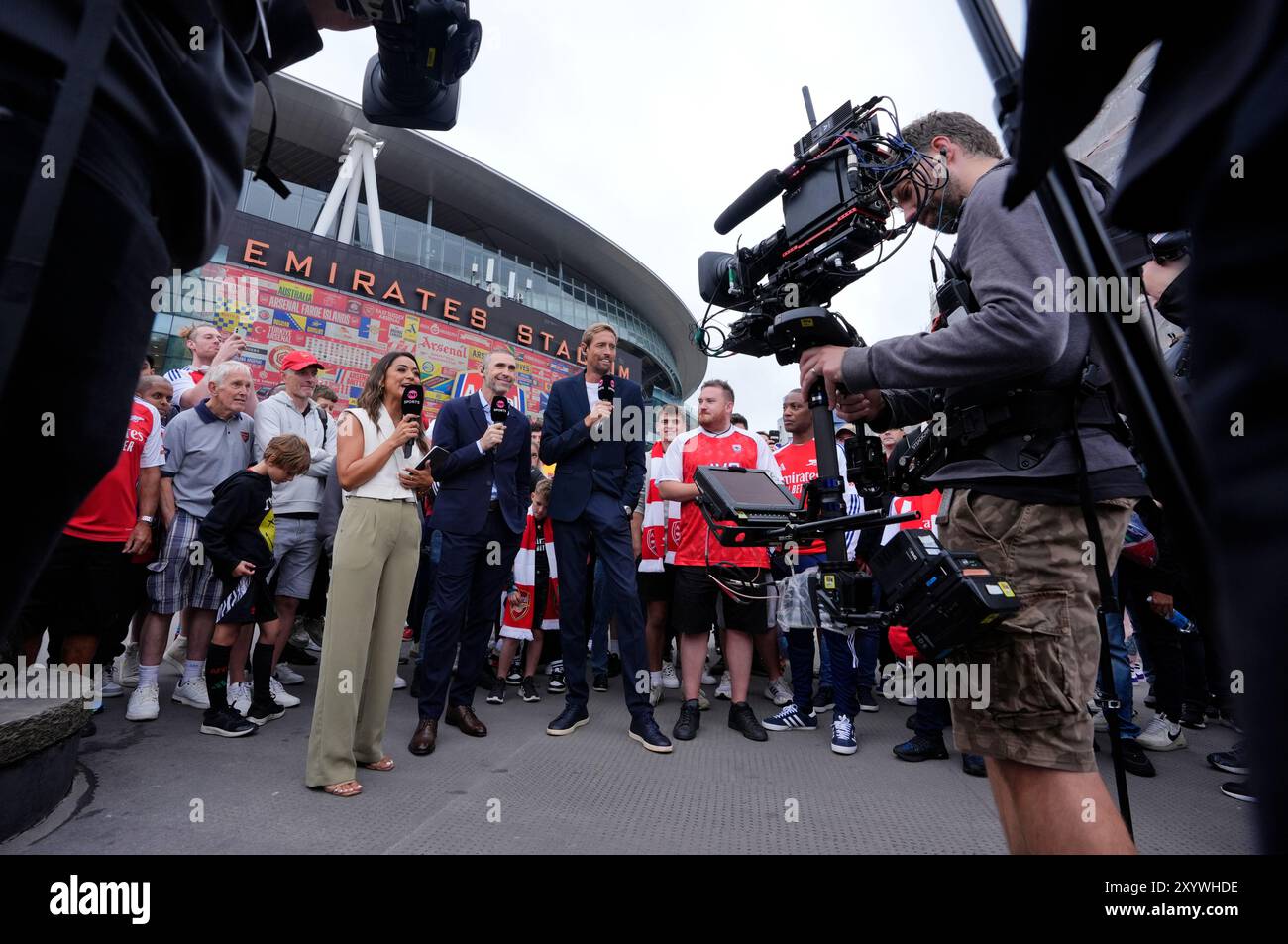 (left to right) TNT Sports presenters Jules Breach, Martin Keown and ...