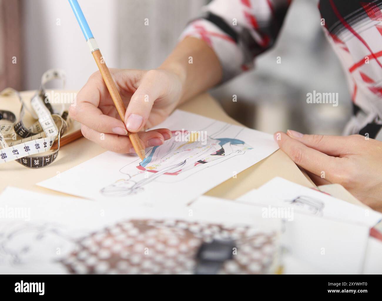 Female dressmaker draws sketch hi-res stock photography and images - Alamy