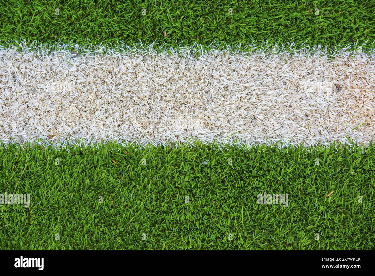 White straight line on artificial turf. From a football field Stock ...