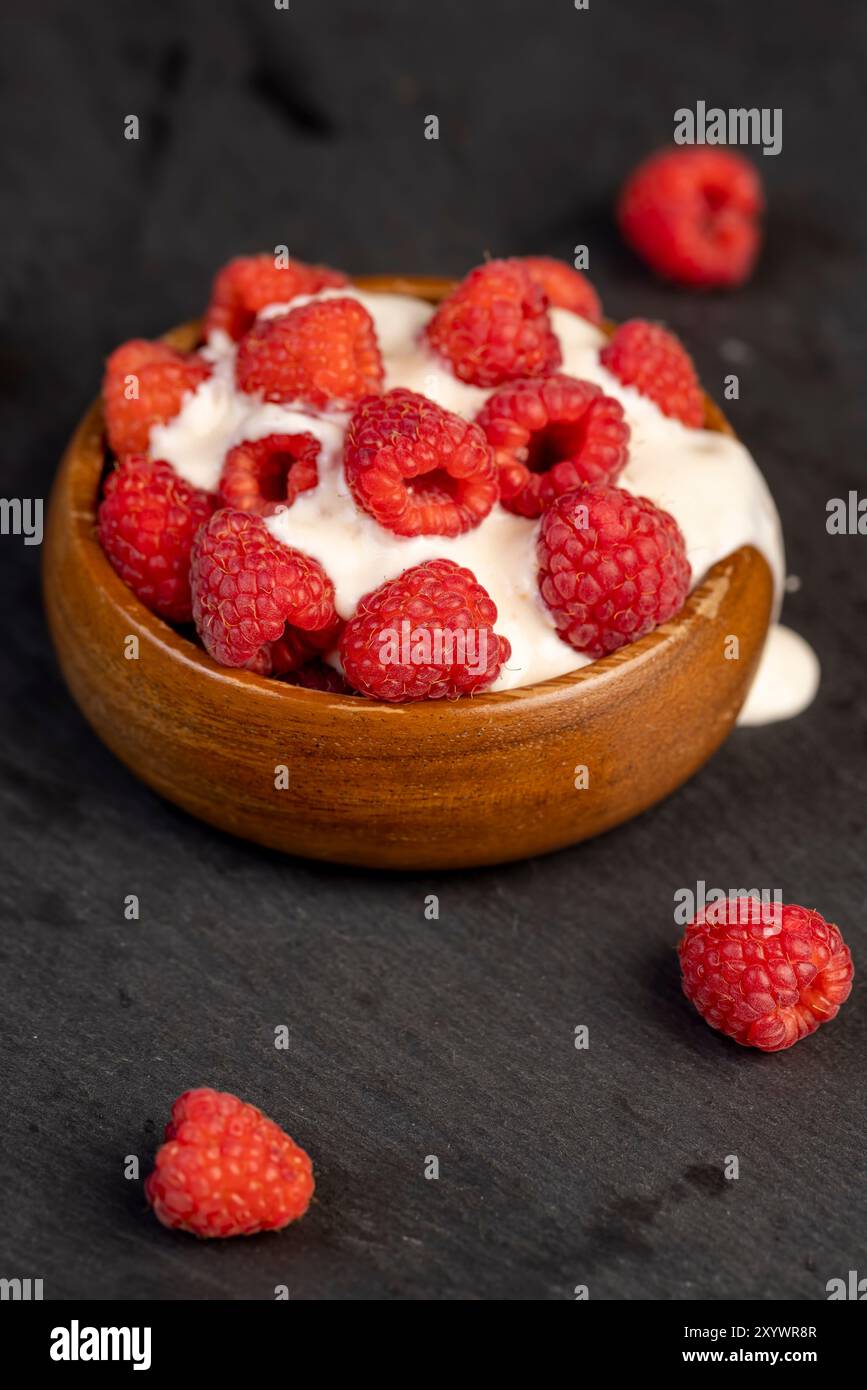 delicious yogurt with raspberry flavor and whole red raspberries ...