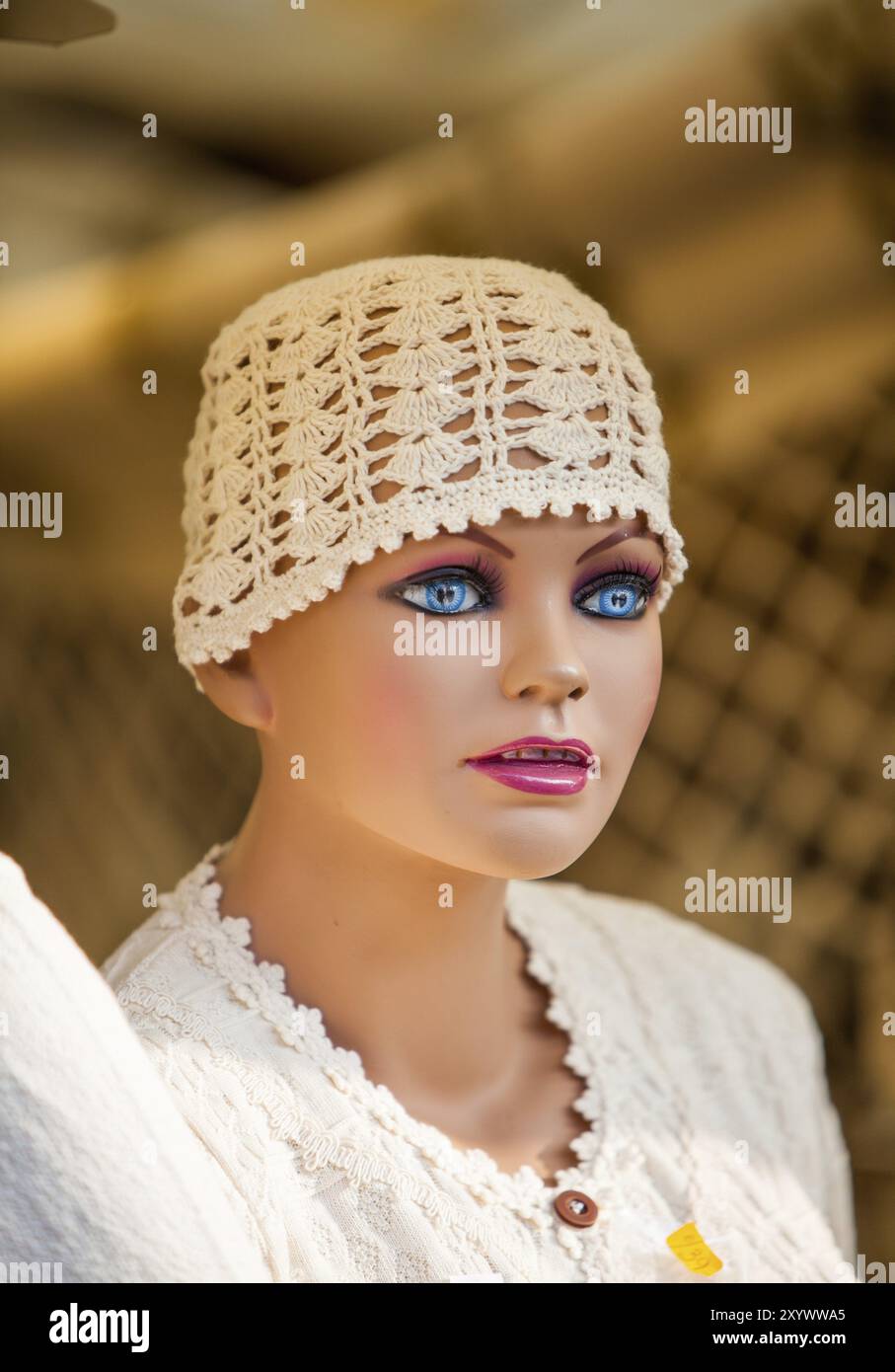 Knitted white cap Stock Photo - Alamy