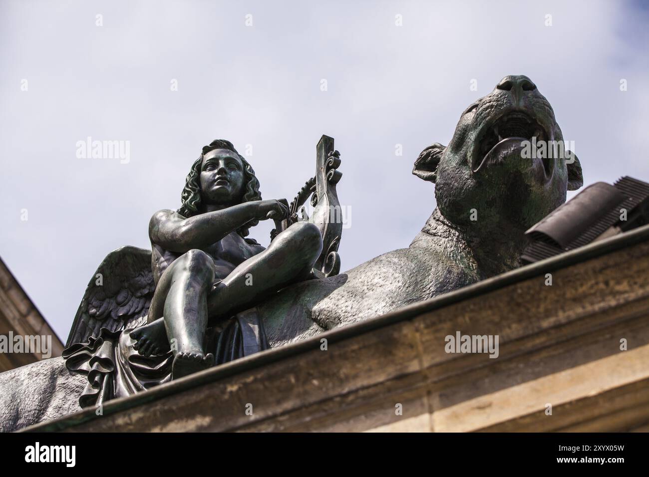 Statue of an angel riding a lioness and playing the harp, taken from ...