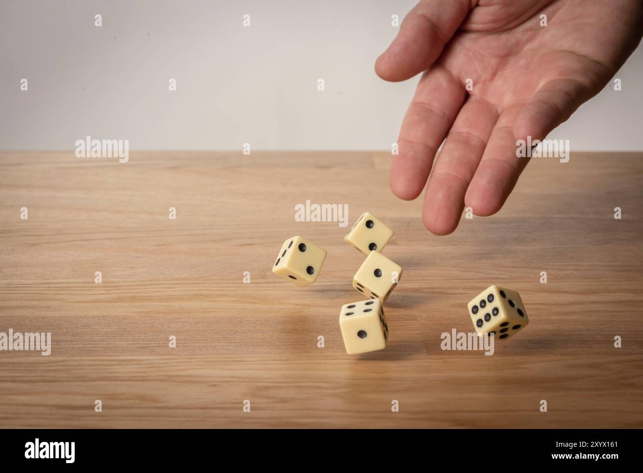 Throwing a dice hi-res stock photography and images - Alamy