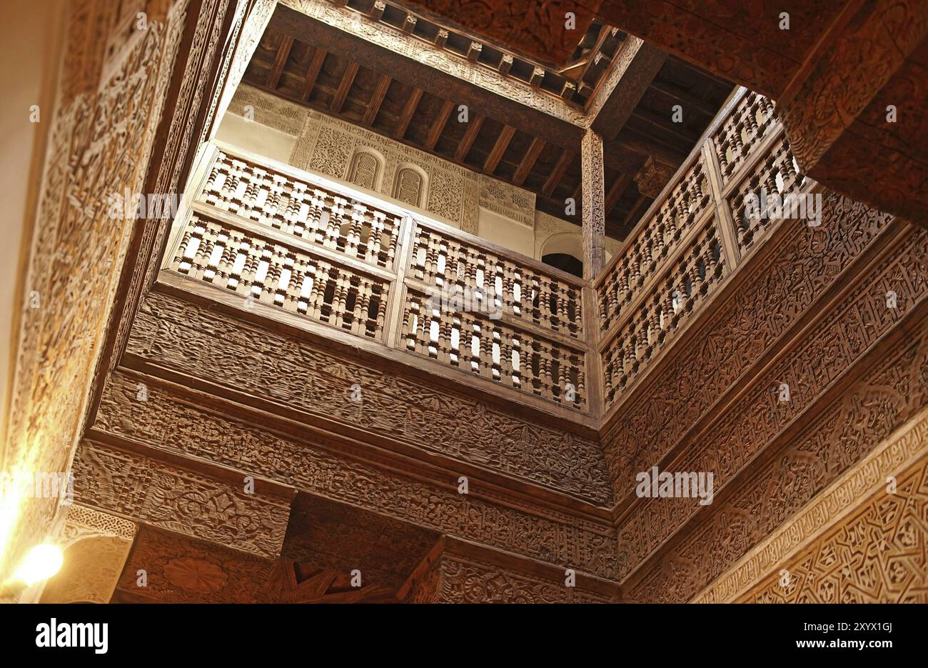 Medersa Ben Youssef, interiors with beautiful wood carvings Stock Photo ...