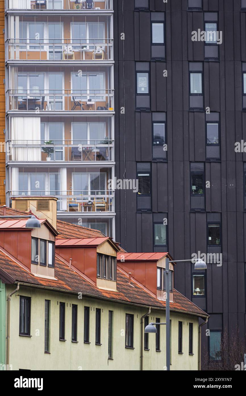 Old apartment building in front of new high rise Stock Photo - Alamy