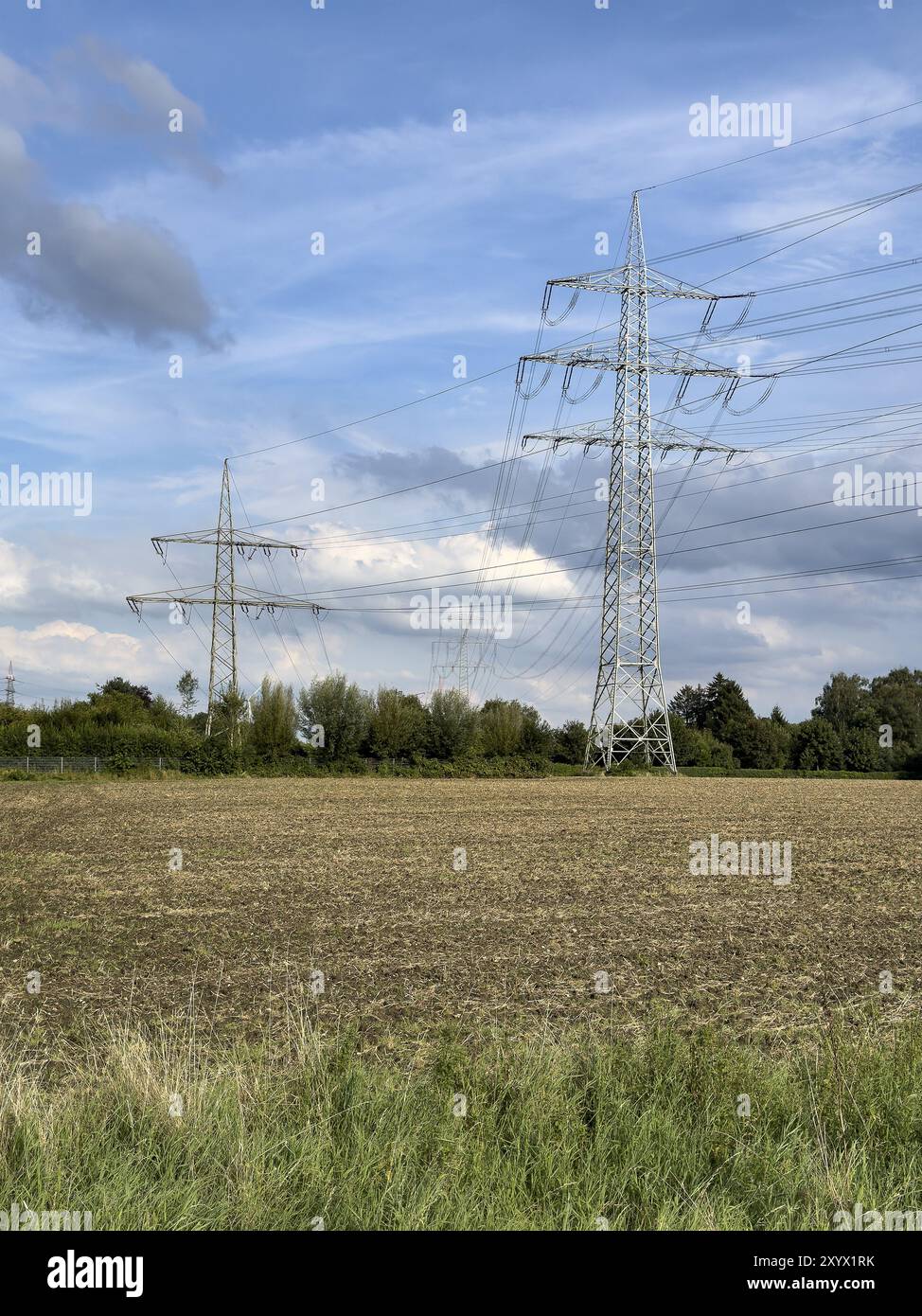 Two overhead line pylons High-voltage pylons Power pylons Support ...