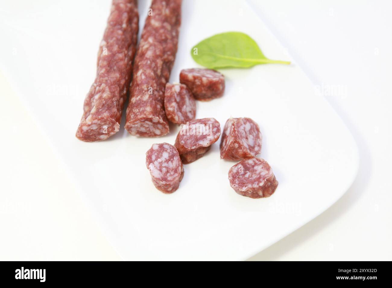 Traditional Dutch sausages from dry meat on white plate Stock Photo - Alamy