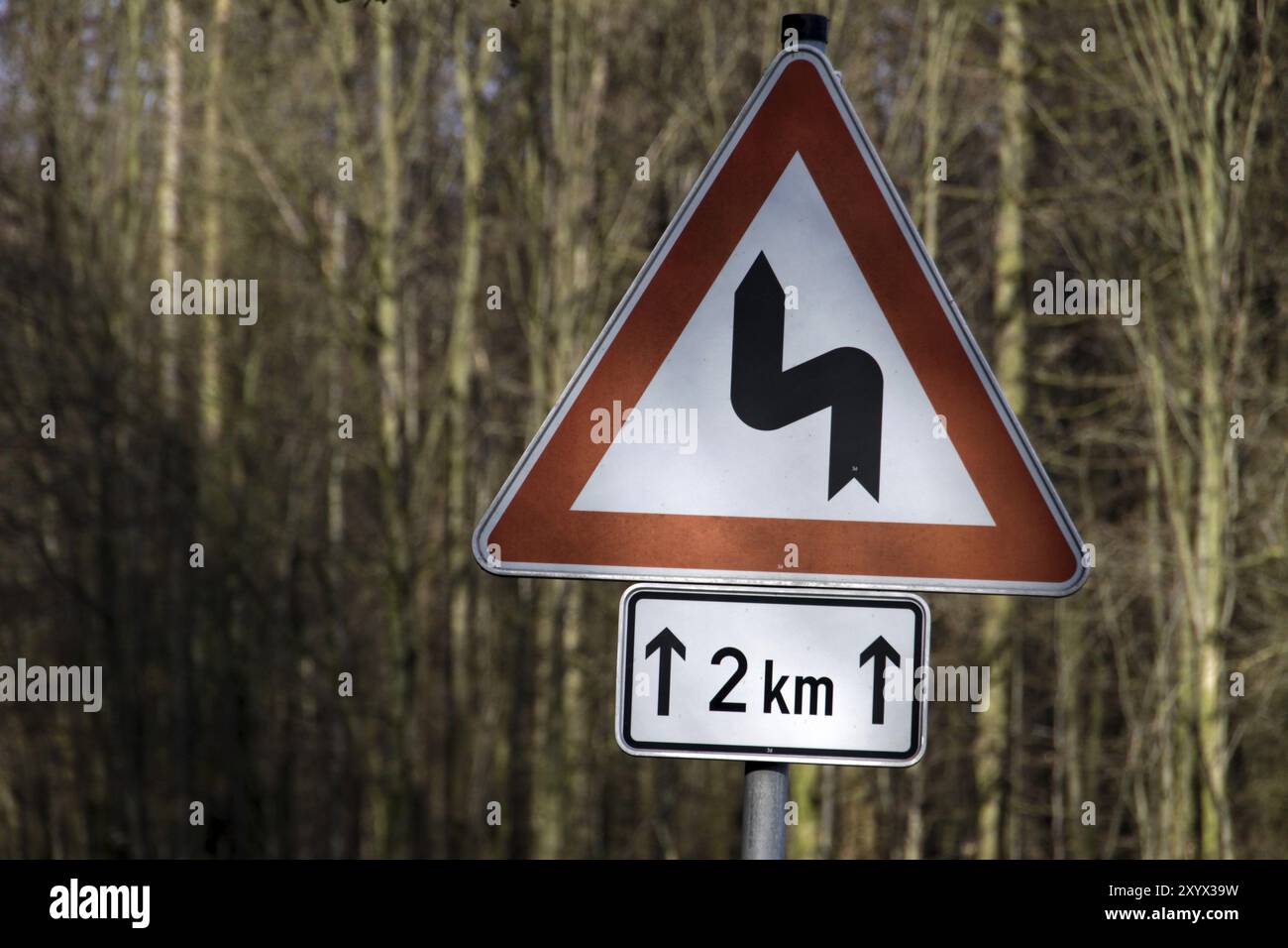 Double curve road traffic sign hi-res stock photography and images - Alamy