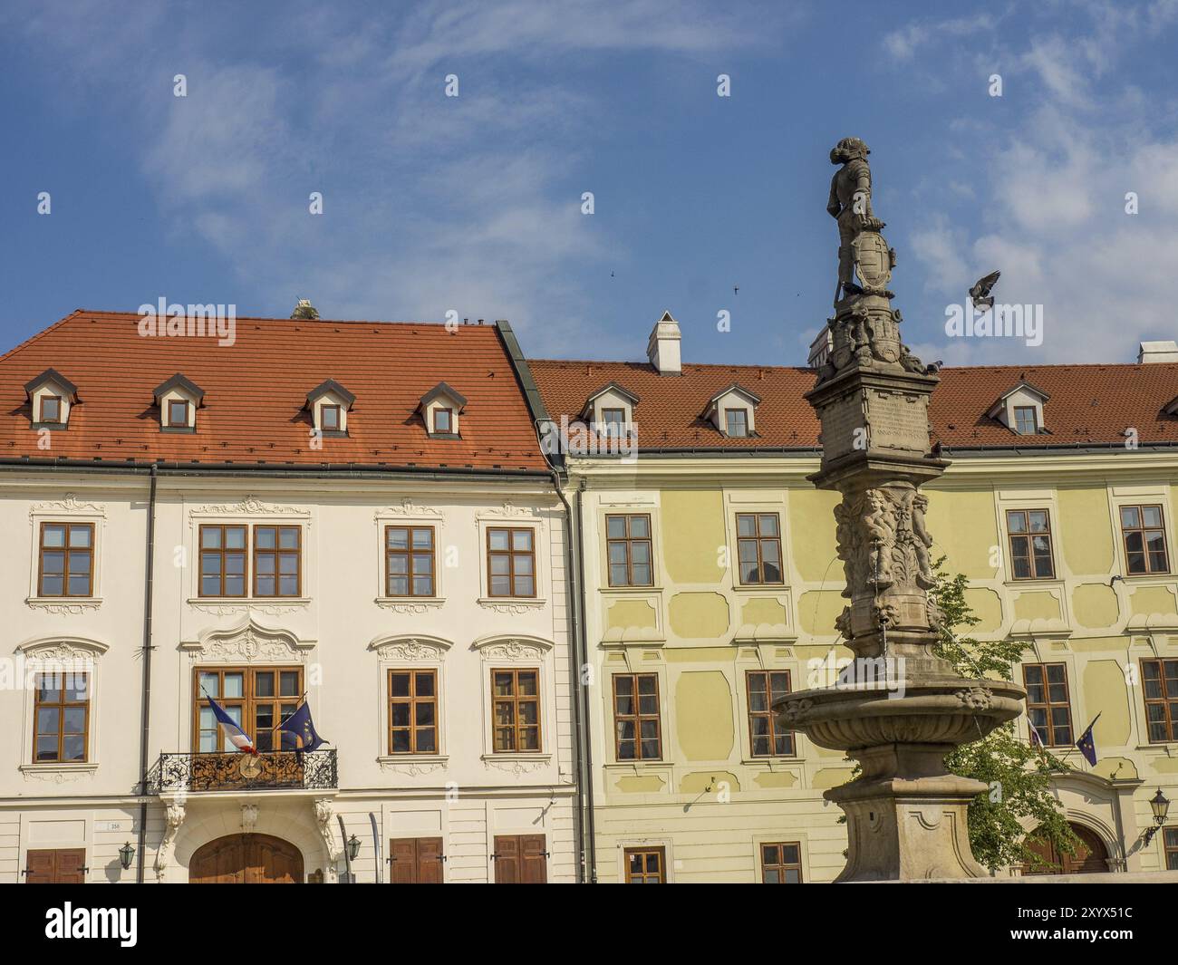 Historic building with Renaissance style, blue sky, baroque details and ...