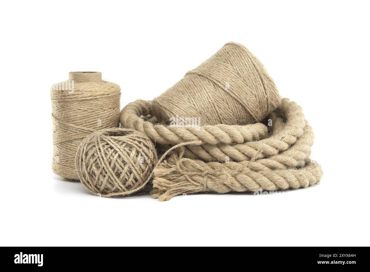 Collection of various rolls of natural jute rough rope and twine ...