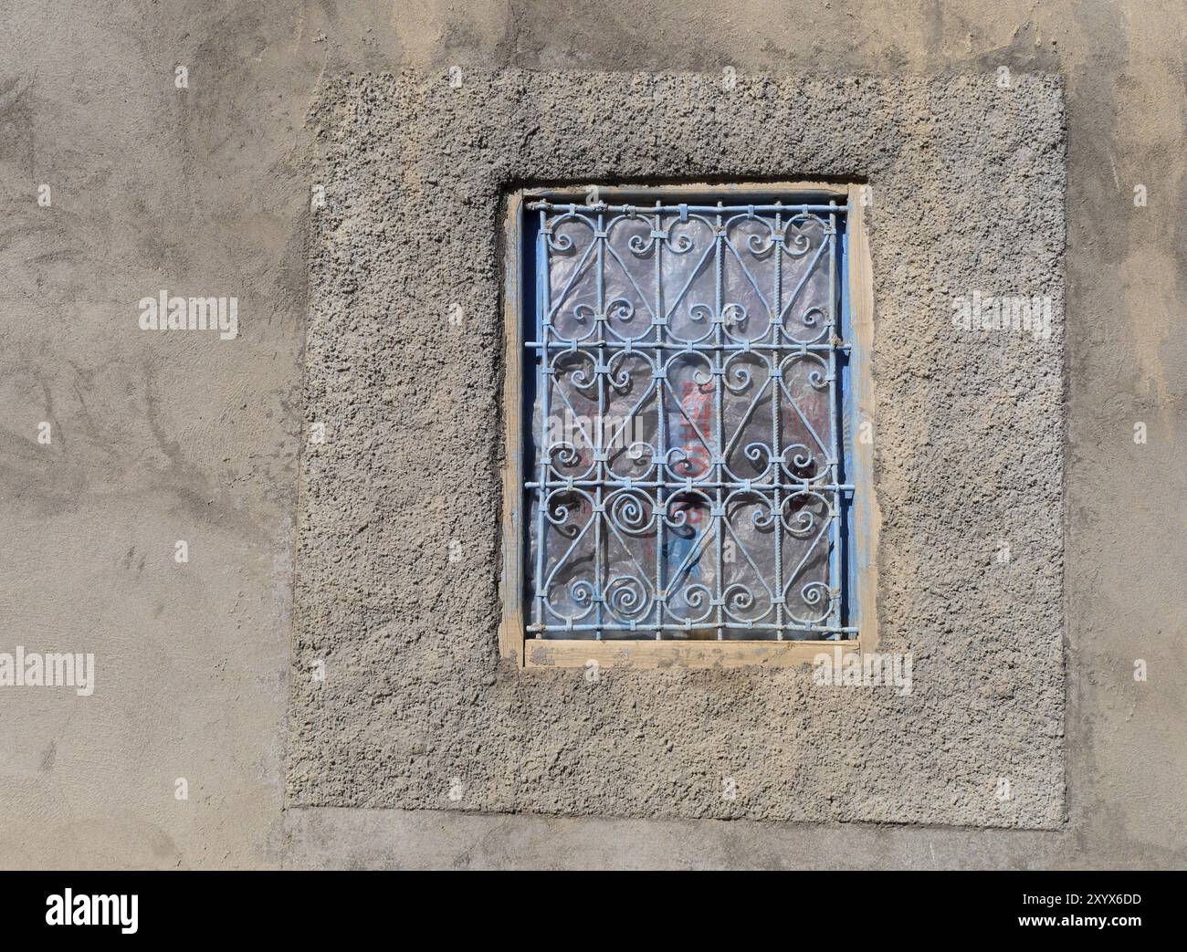 Barred window in Morocco Stock Photo - Alamy