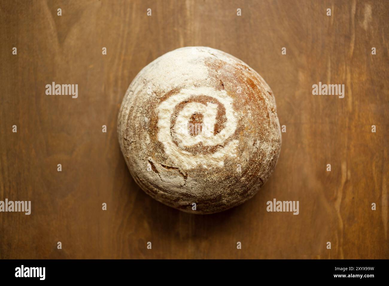 Bread with an AT symbol Stock Photo - Alamy