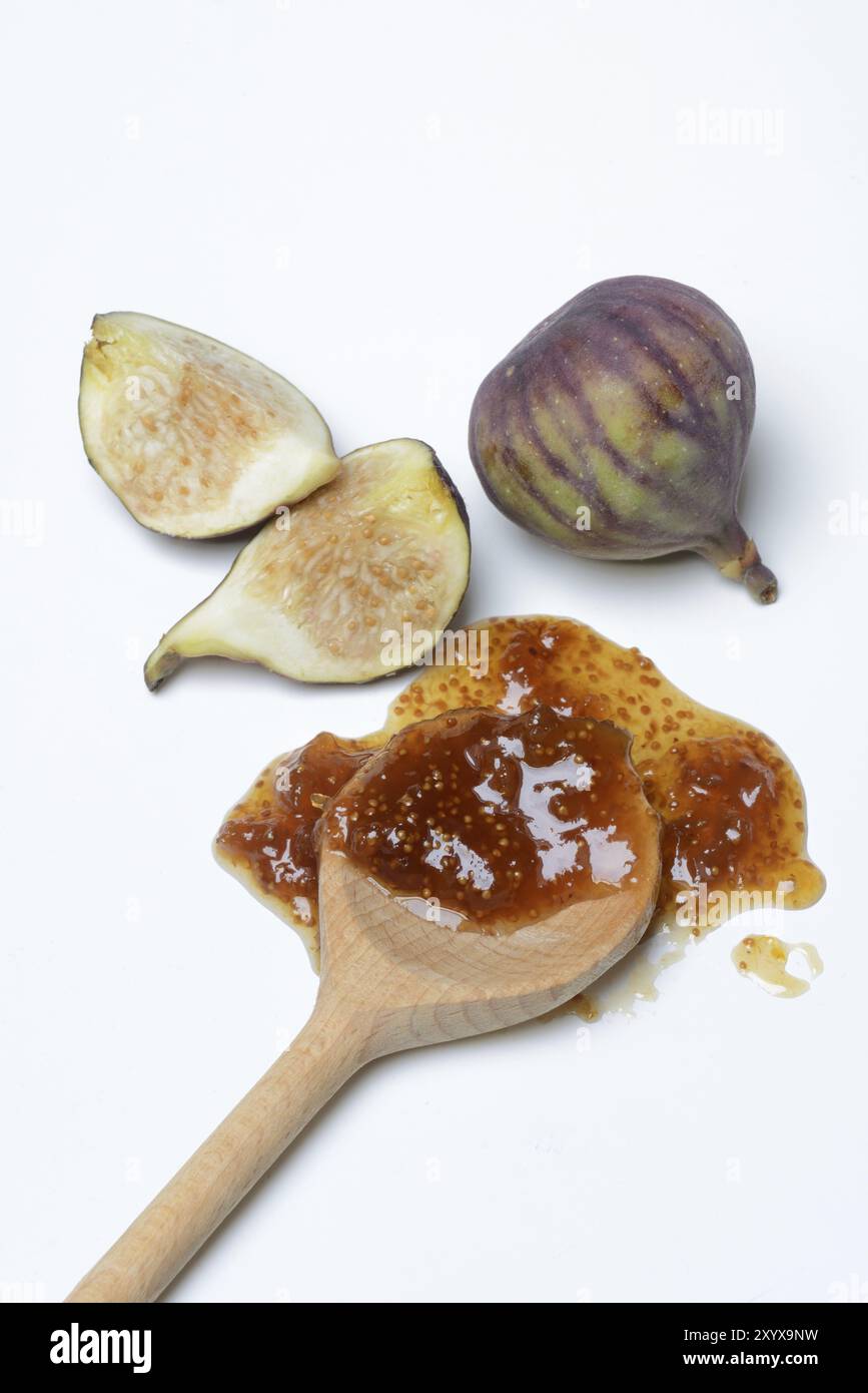 Fig jam in cooking spoon and fresh figs, Ficus carica Stock Photo - Alamy