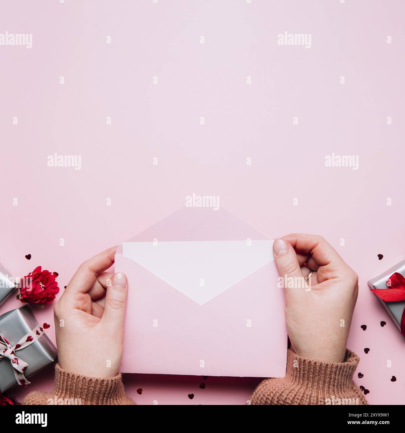 Female hands hold love letter empty message in open envelope, Valentine ...