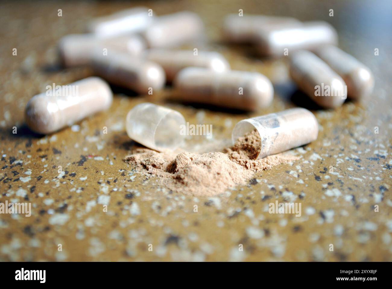 Close up of opened translucent capsules with medicine Stock Photo - Alamy