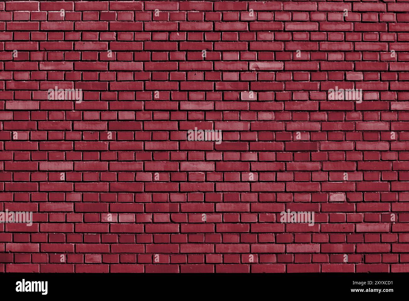 Chili pepper colored brick wall background Stock Photo - Alamy