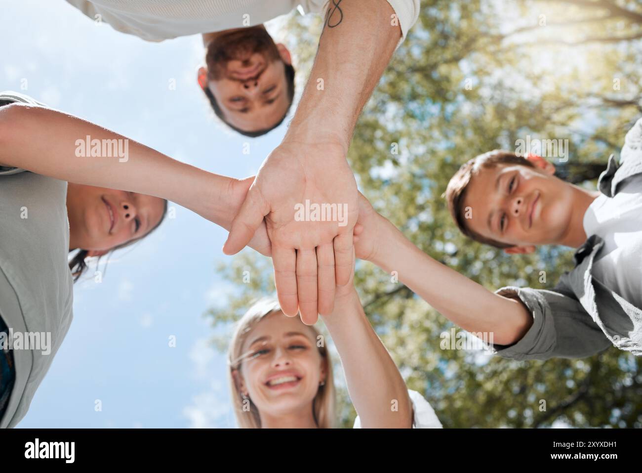 Family, huddle and children hands together with portrait and smile from ...