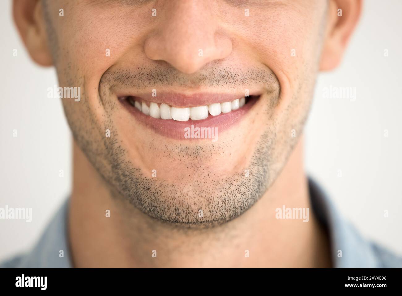 Close up of male toothy smile, shaved chin with stubble Stock Photo - Alamy