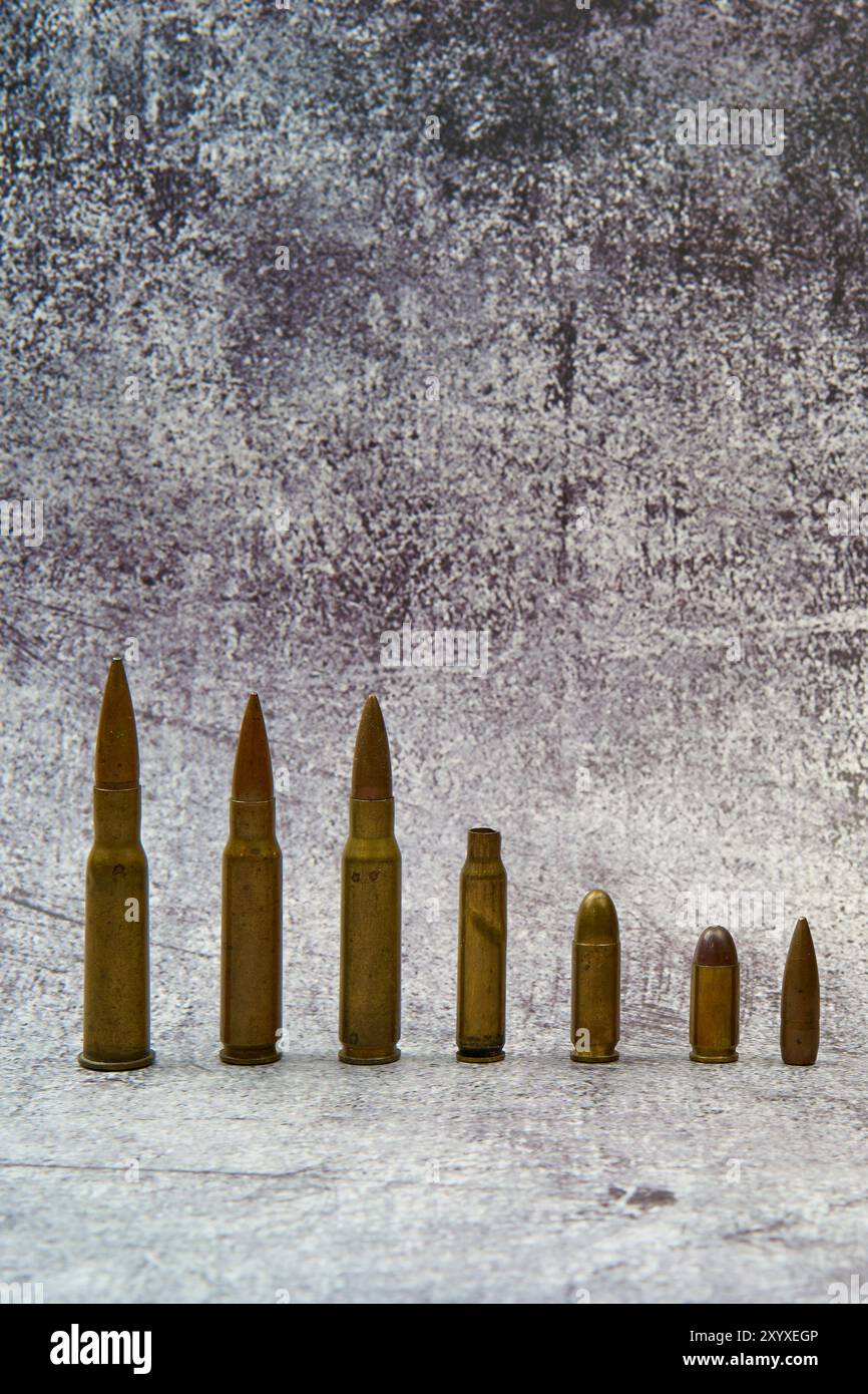 Aligned bullets of different calibres Stock Photo - Alamy