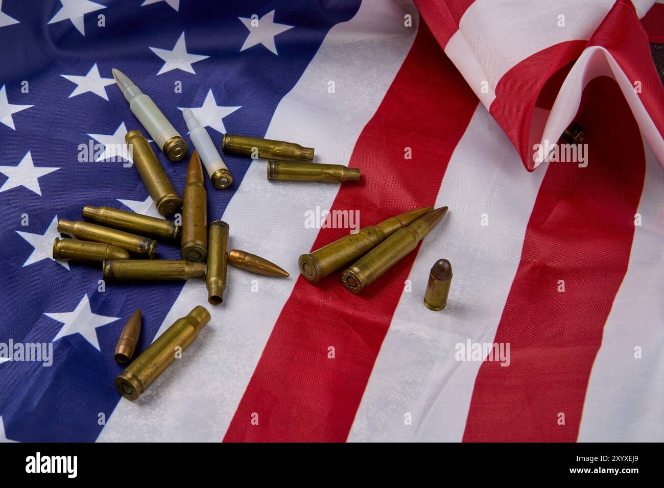 Different types of ammunition on top of flag of the United States Stock ...